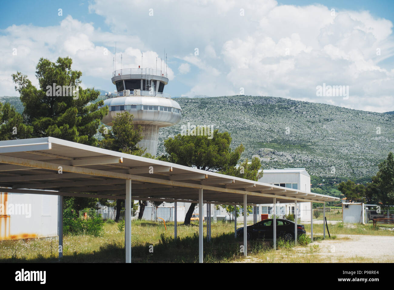 the stylish 1960s look of the airport control tower in Mostar, Bosnia ...