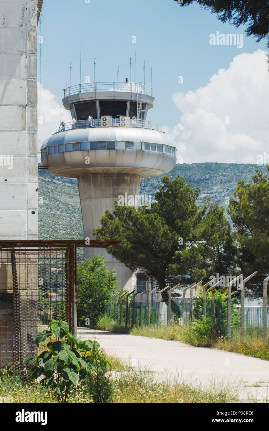 the stylish 1960s look of the airport control tower in Mostar, Bosnia ...