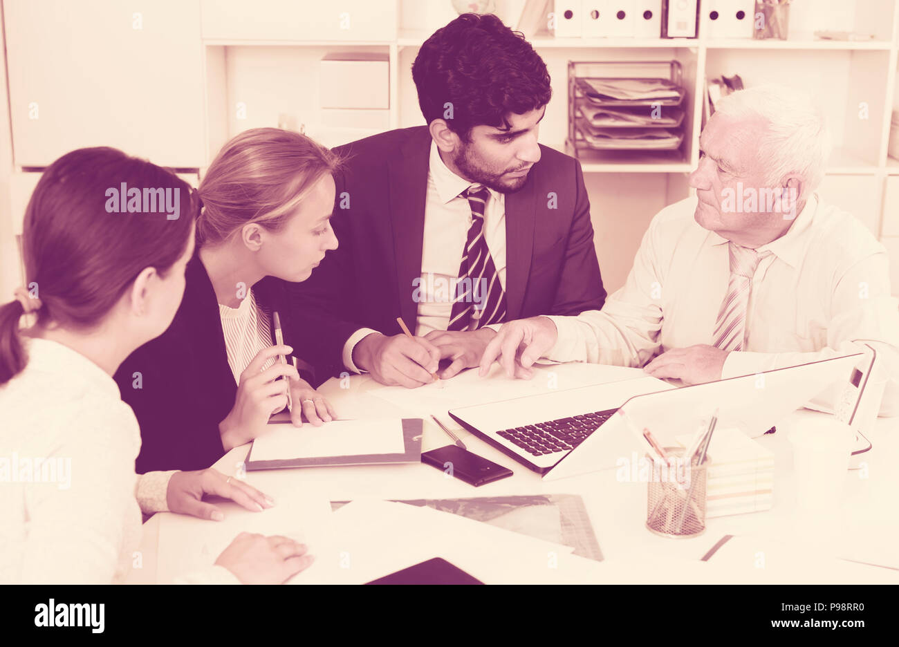 Office workers are writing financial reports in the office Stock Photo ...