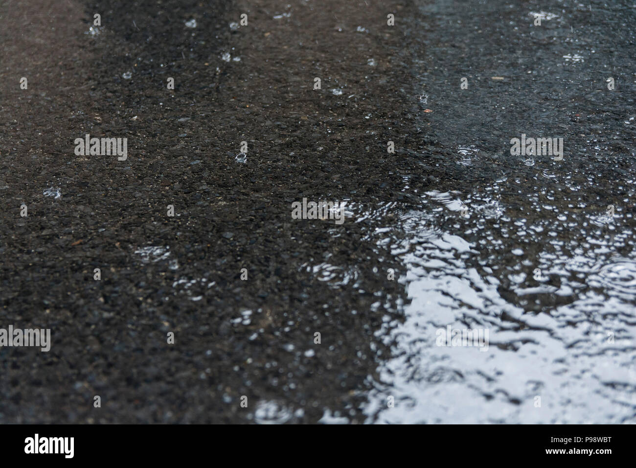 Empty city street in rain hi-res stock photography and images - Alamy