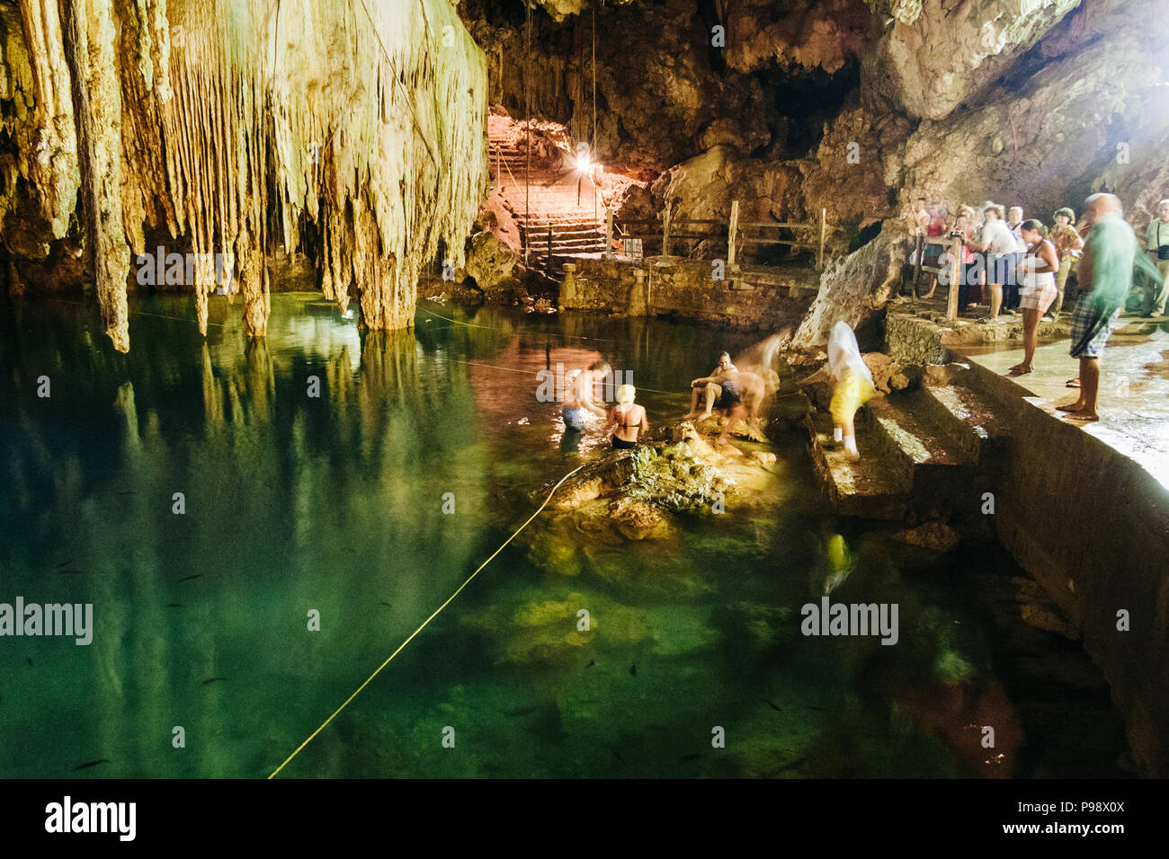 Valladolid, Yucatan, Mexico : tourists relax at Cenote Dzitnup also ...