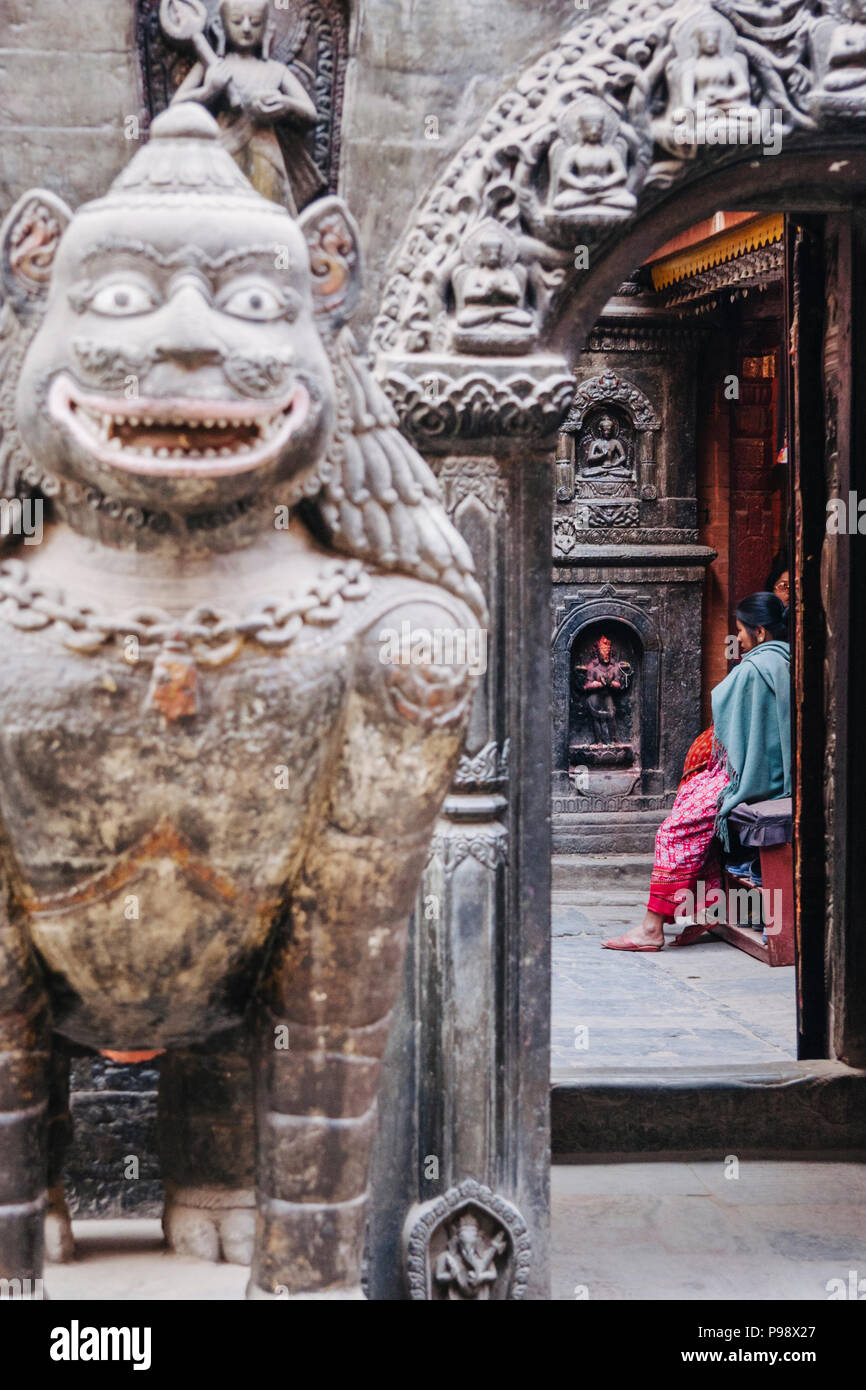 Lalitpur, Kathmandu Valley, Nepal : Women sit at the courtyard of the ...