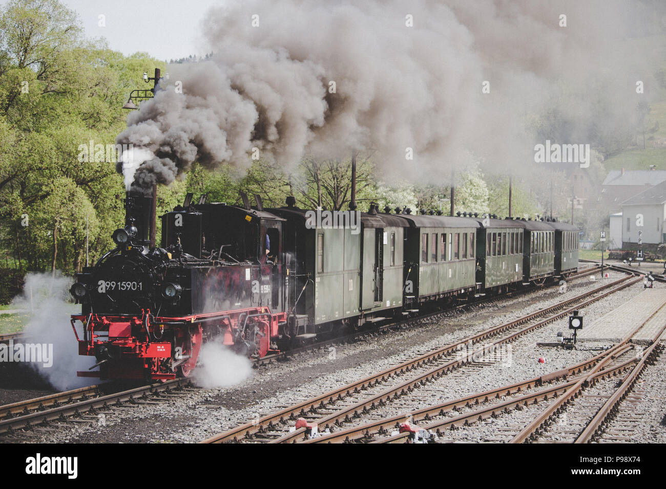 Steam Train in Station Stock Photo - Alamy
