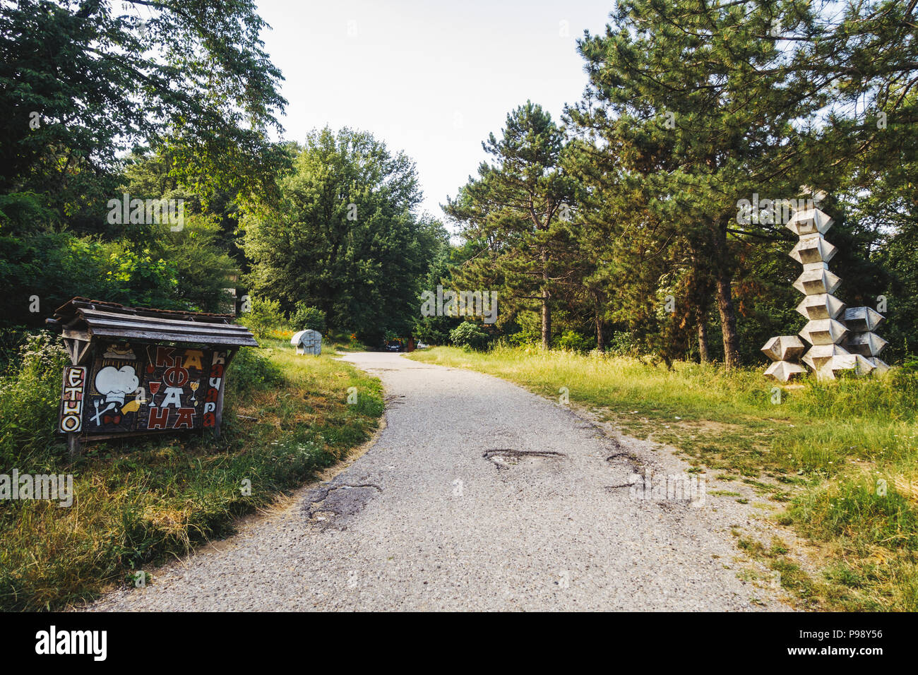 An obscure monument in the forest at the entrance to a campground in ...