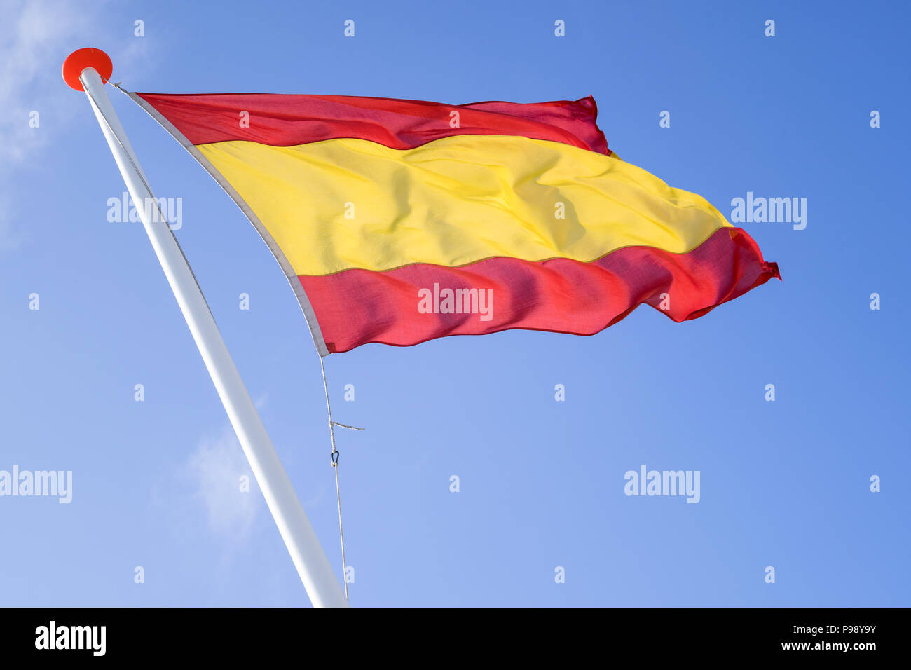 Spain flag blowing in wind hi-res stock photography and images - Alamy