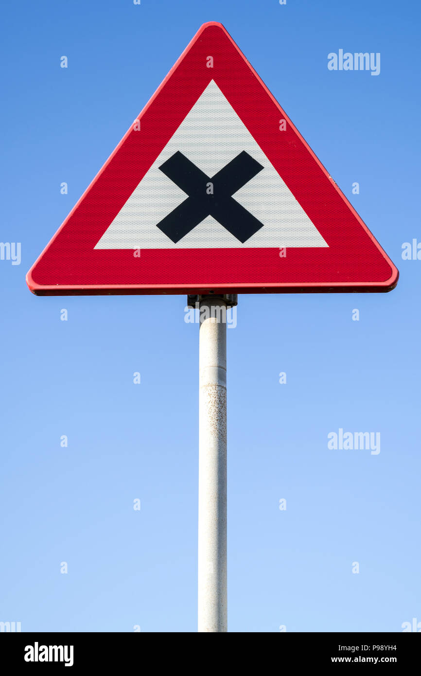 Dutch road sign: dangerous crossing Stock Photo - Alamy