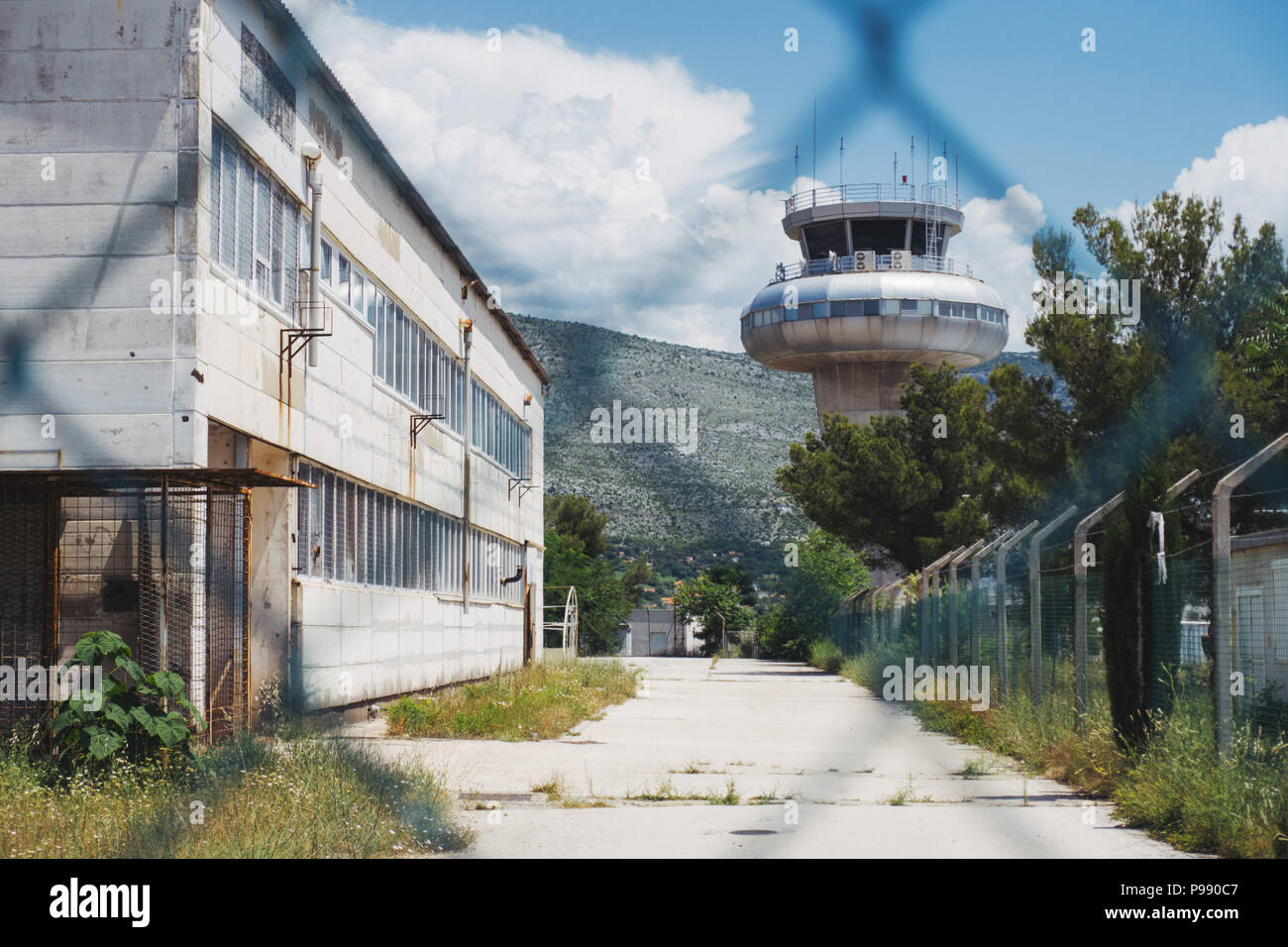 The retro style air traffic control tower of Mostar Airport, Bosnia ...