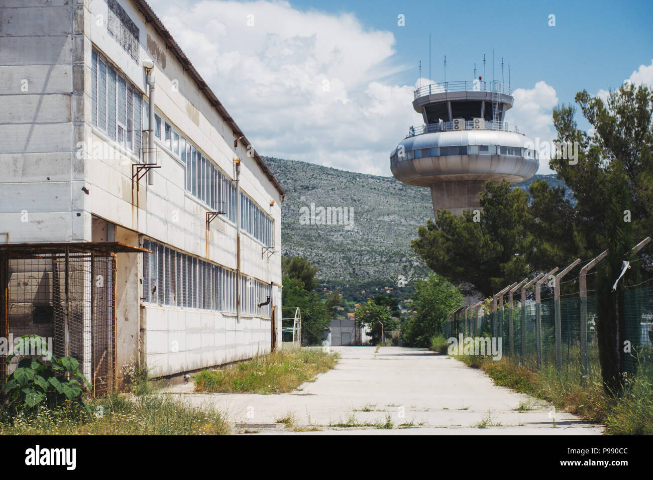 The retro style air traffic control tower of Mostar Airport, Bosnia ...