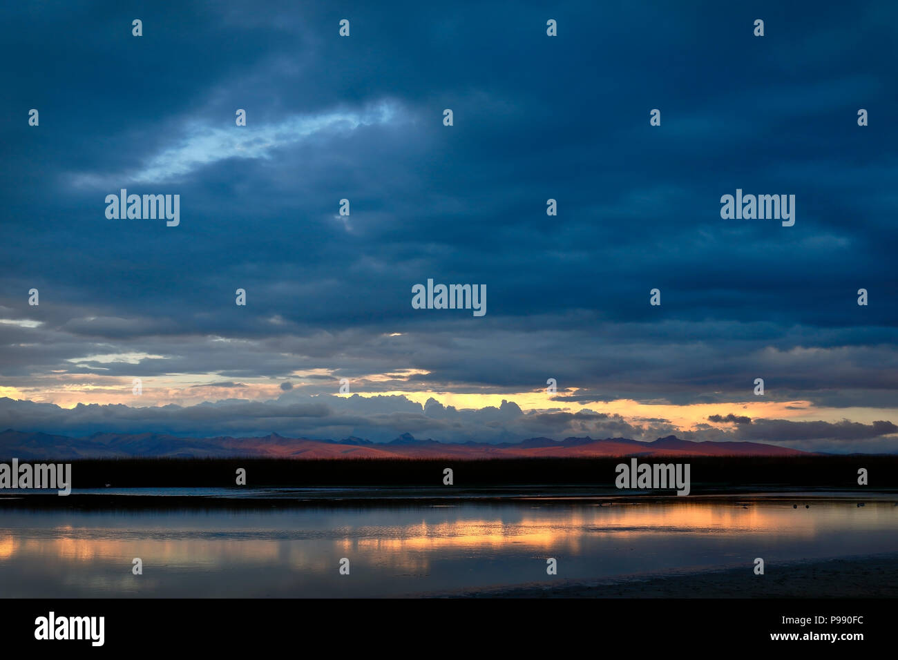 Beautiful sunset on the shores of Lake Junin Stock Photo - Alamy