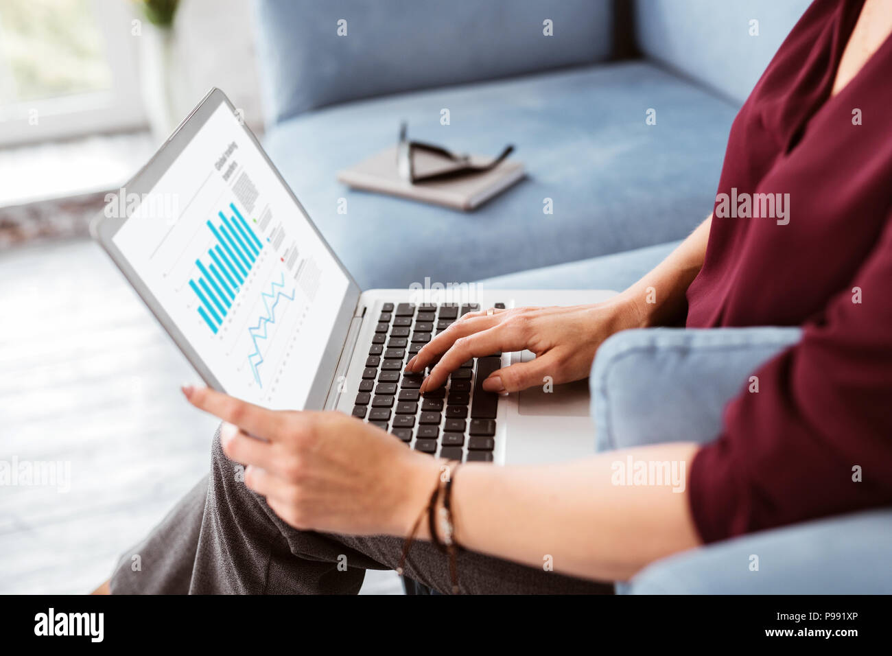 Clever businesswoman making a plan while looking at her device Stock ...