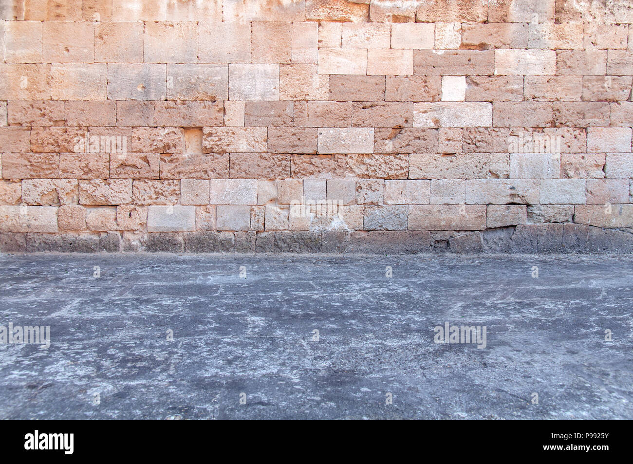 Castle cement floor with yellow rugh pattern stone block from ancient ...