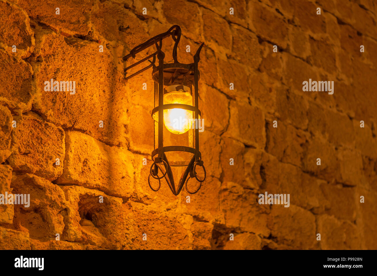 Torch on wall old castle hi-res stock photography and images - Alamy