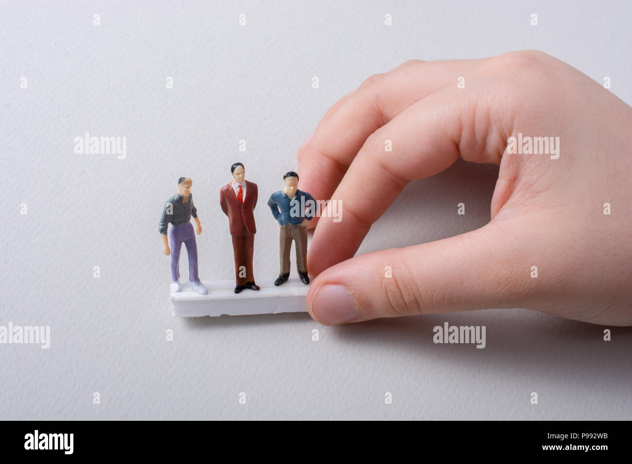 Tiny figurine of man miniature model in view Stock Photo - Alamy