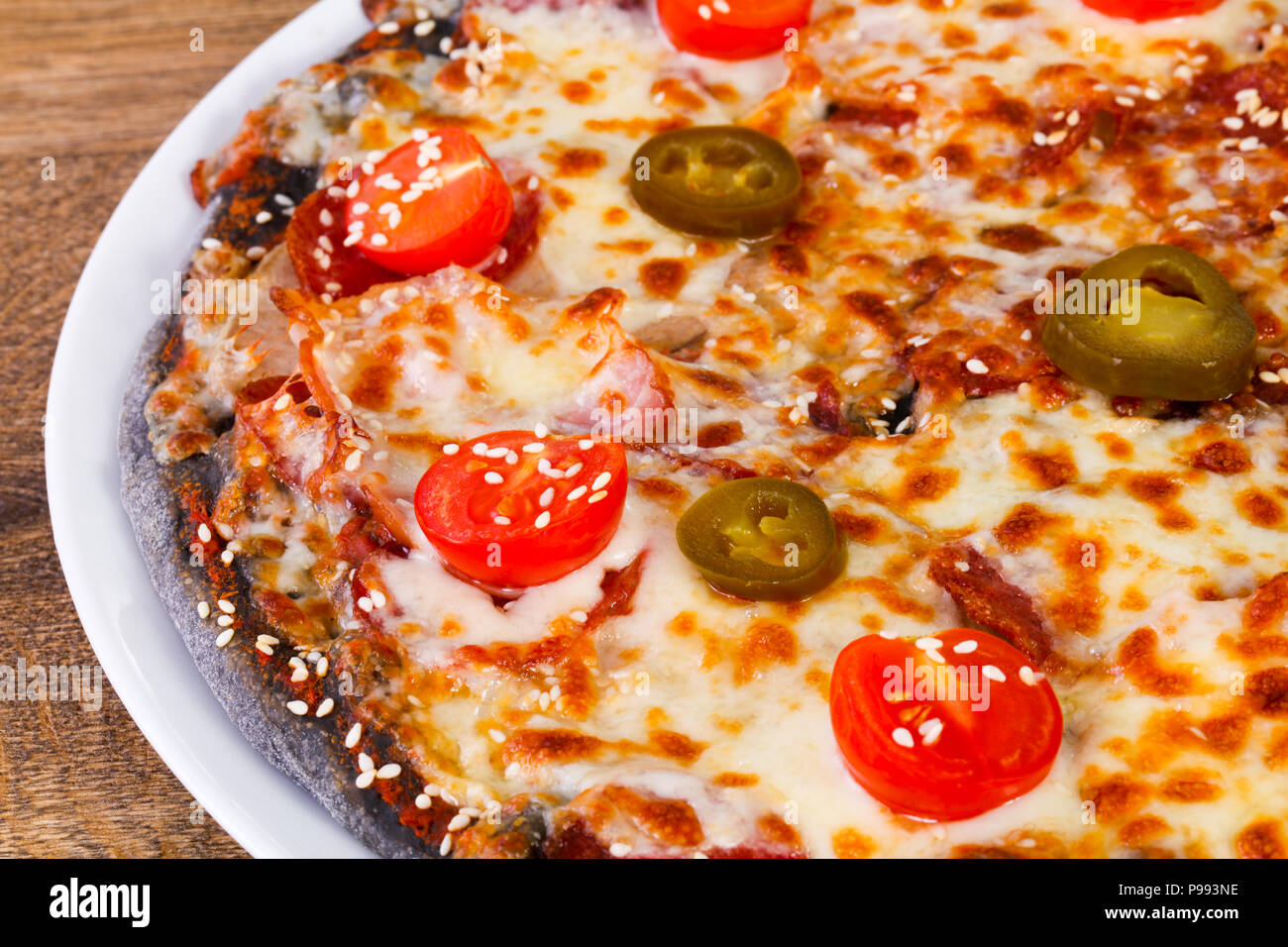 Pizza pepperoni with pepper halapenjo Stock Photo - Alamy