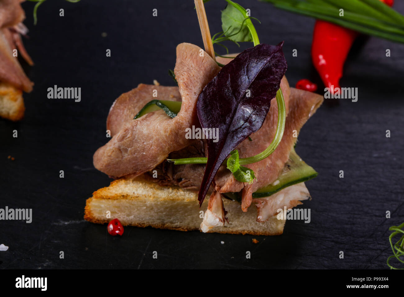 Beef canape served green onion Stock Photo - Alamy