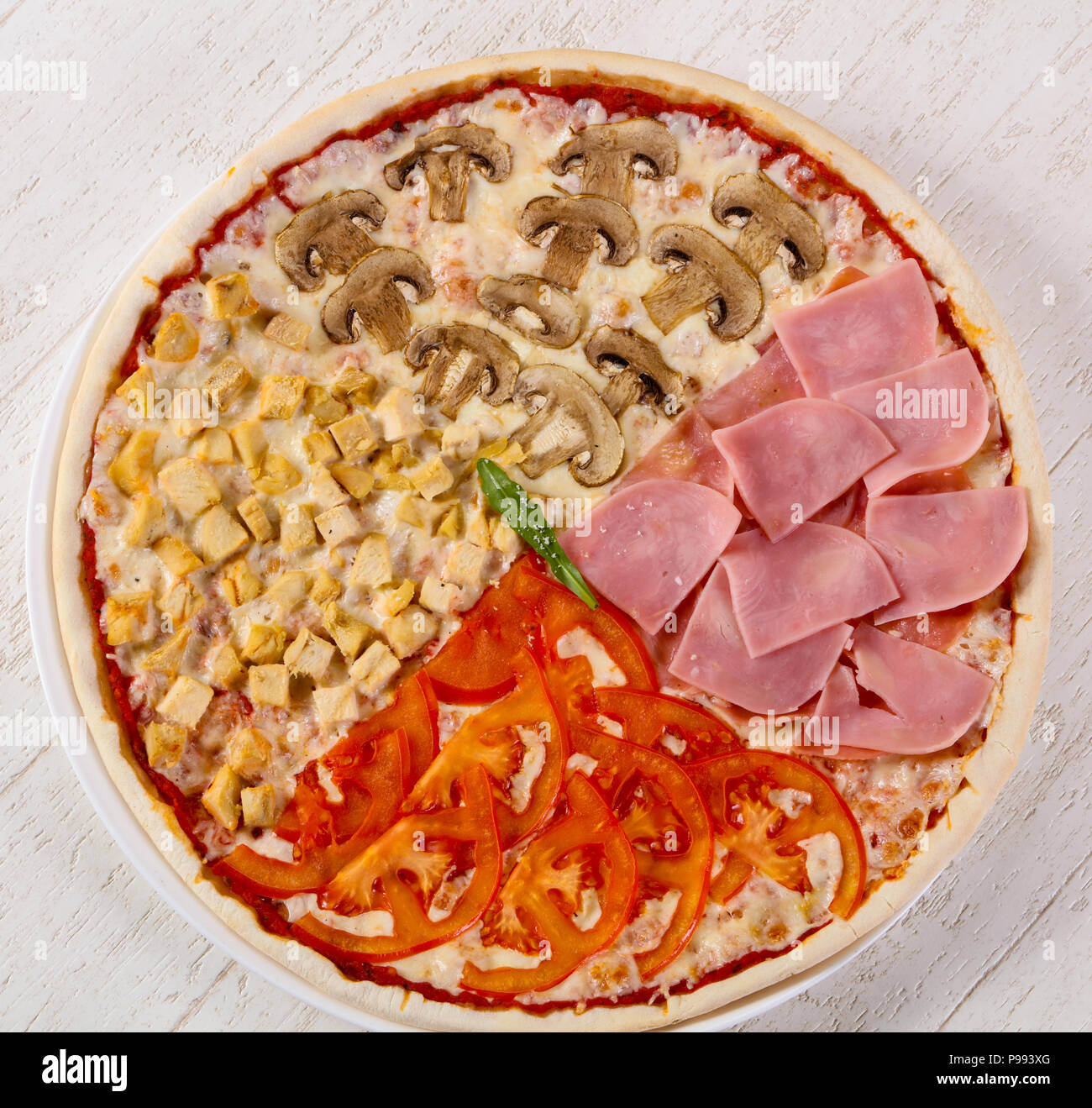 Pizza assortment mix with ham and mushrooms Stock Photo - Alamy