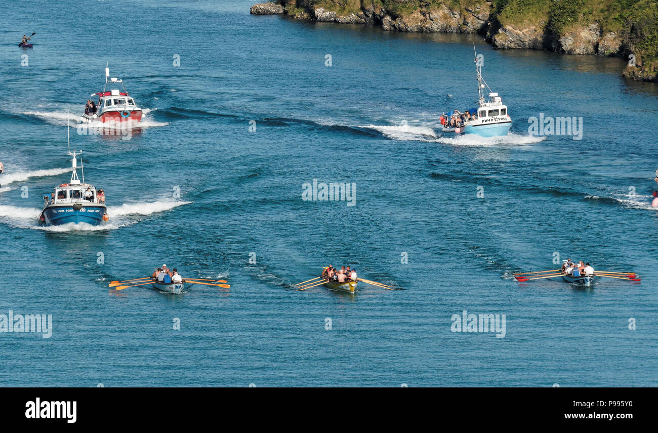 Fishing boats follow gig rowers hi-res stock photography and images - Alamy