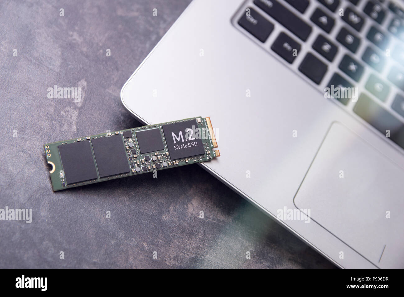 Fast M.2 Solid State Drive lies on a modern aluminum laptop Stock Photo ...