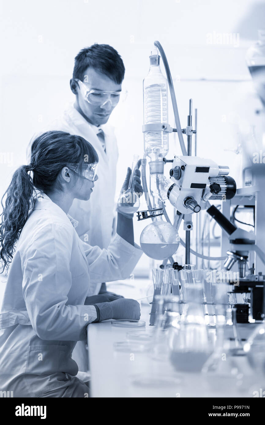 Team professional young chemists hi-res stock photography and images ...