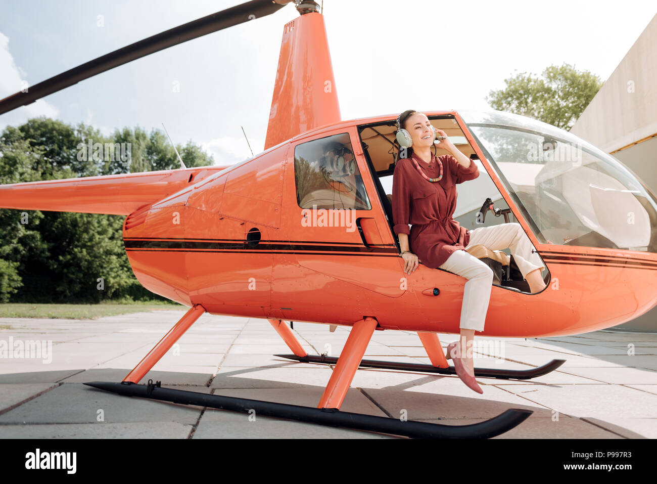 Joyful jolly woman wishing flying Stock Photo - Alamy