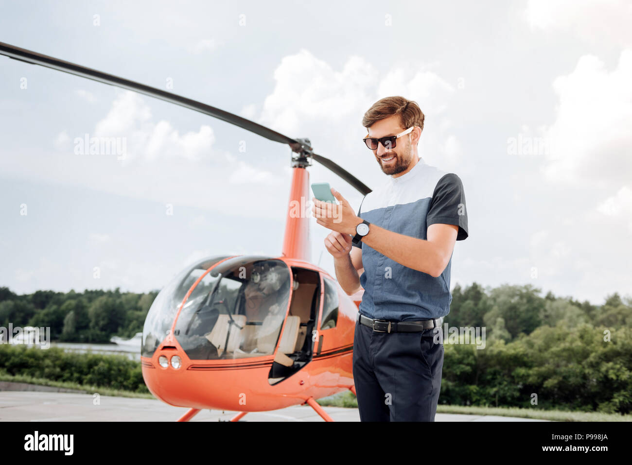 Happy glad man posting photo Stock Photo - Alamy