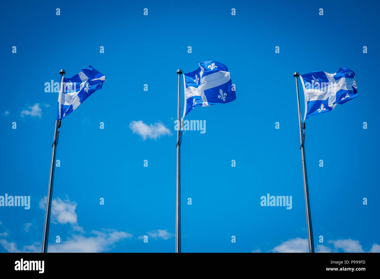 Flags of quebec hi-res stock photography and images - Alamy