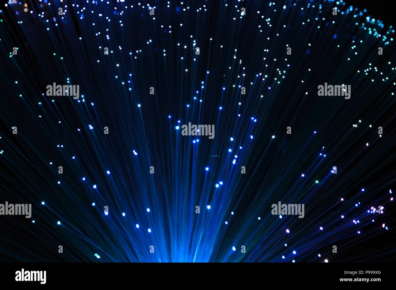 Fiber optics in blue, close up with bokeh Stock Photo - Alamy