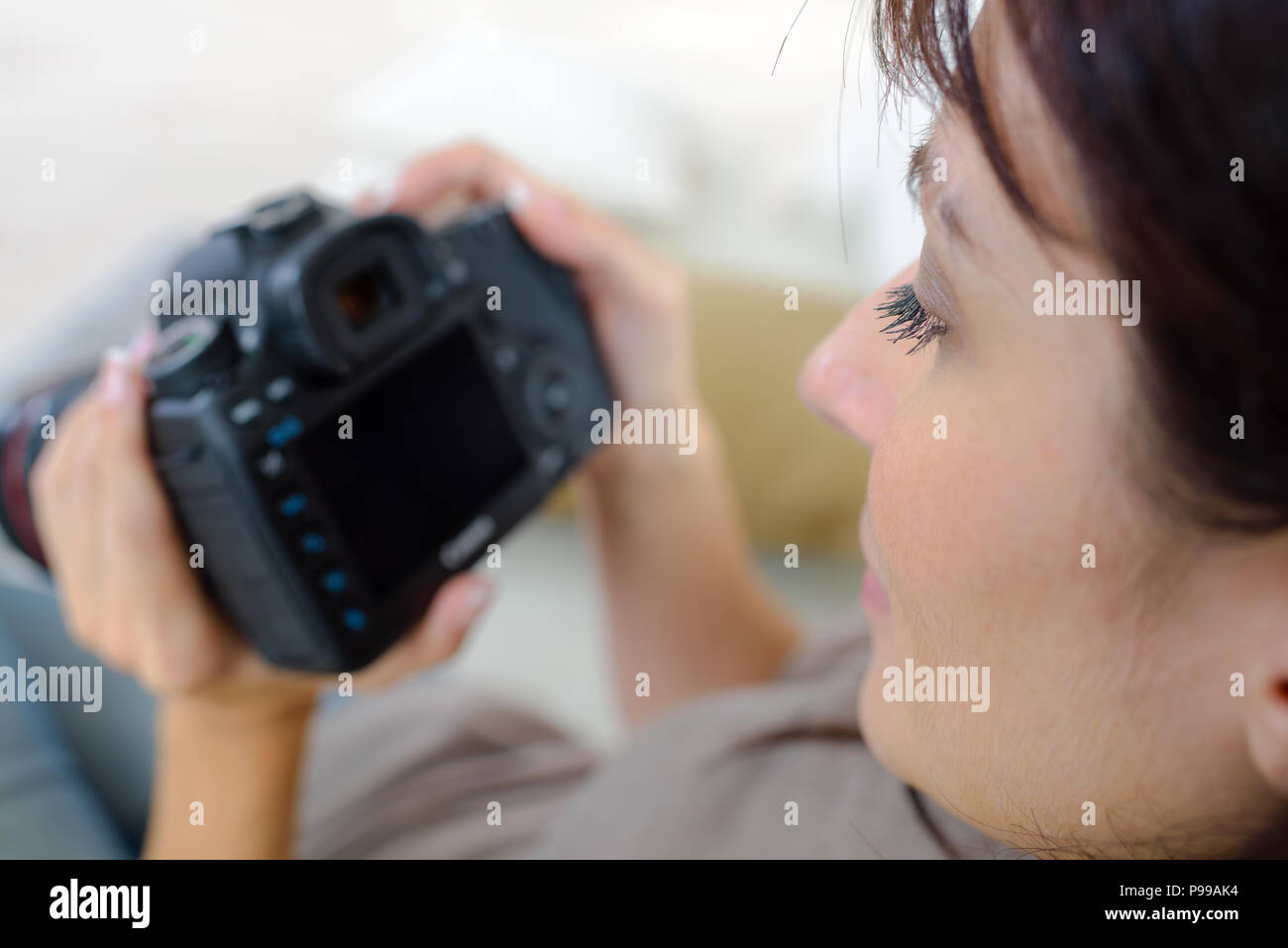 Woman turning dial on hi-res stock photography and images - Alamy