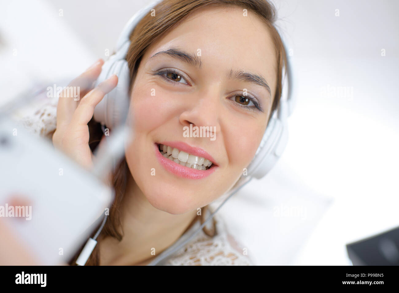 young female with headphones Stock Photo - Alamy