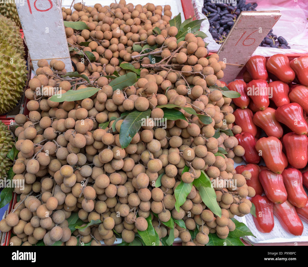 Big Bunch of Longan Tropical Fruits at Market Stock Photo - Alamy