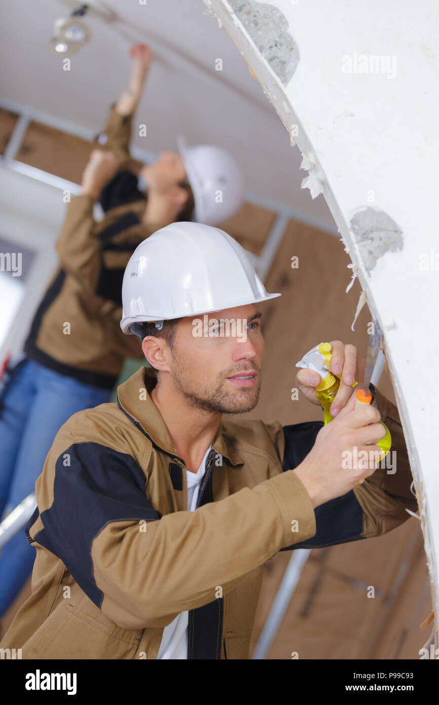 facade builder plasterer at work Stock Photo - Alamy