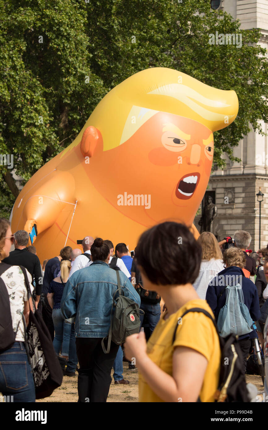 Iconic 'Trump Baby' giant inflatable balloon looms over crowds at ...
