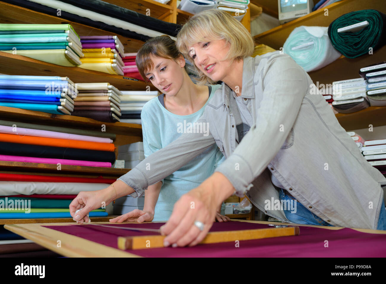 measuring a fabric Stock Photo - Alamy
