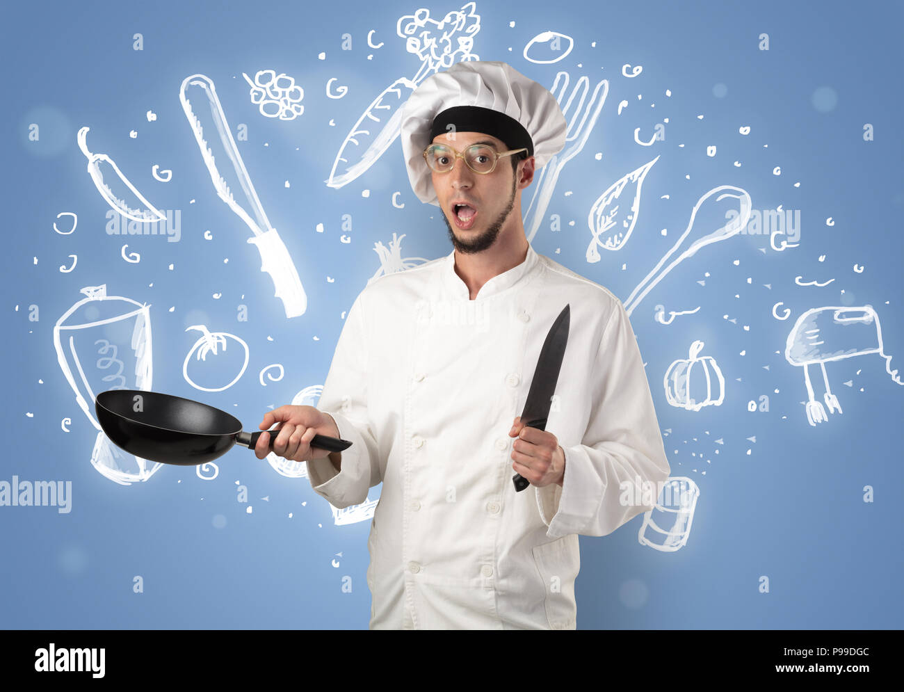 Young cook with kitchen instruments and drawn recipe concept on ...