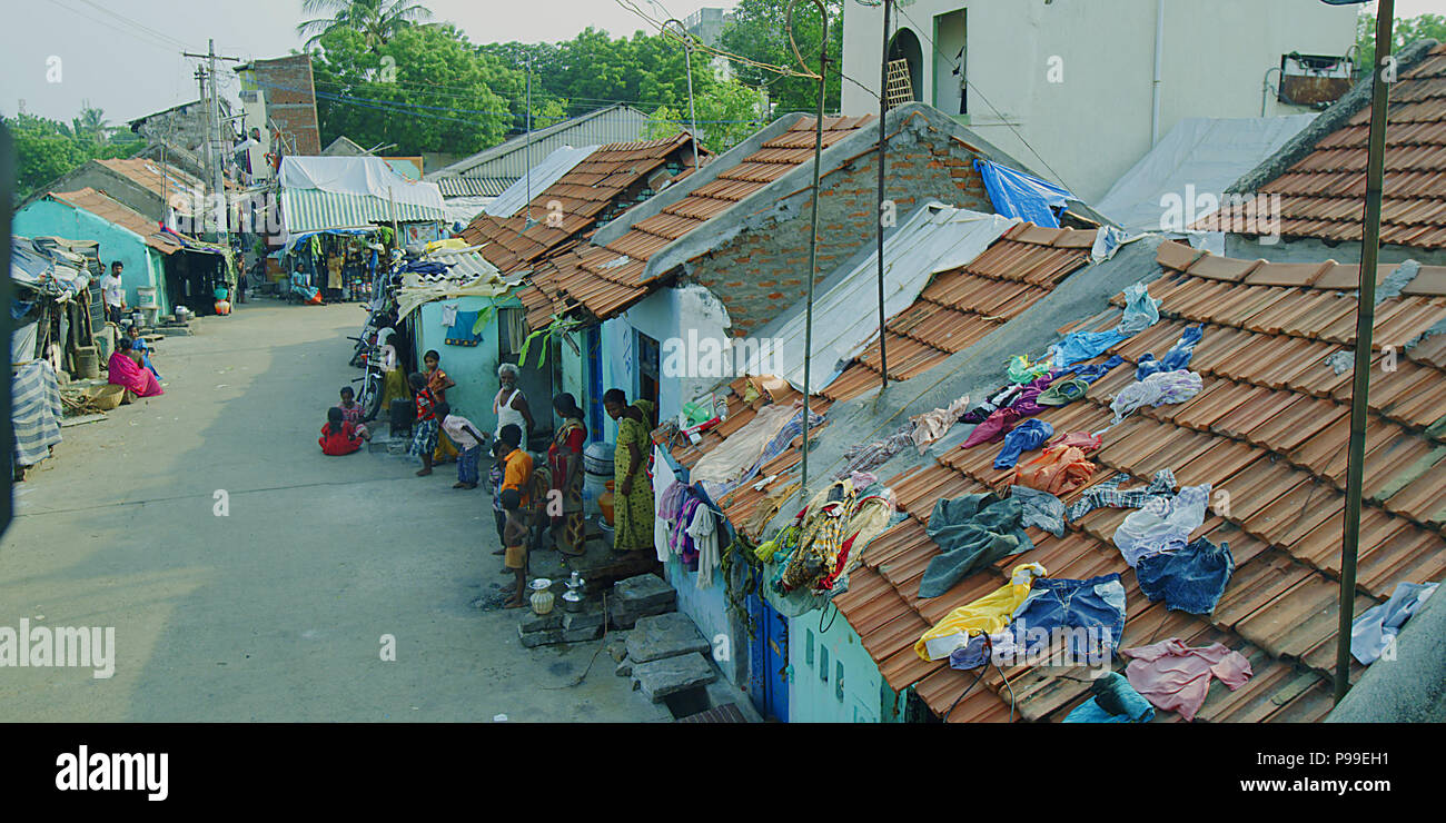 Unidentified poor people near their houses at slums in india Stock ...