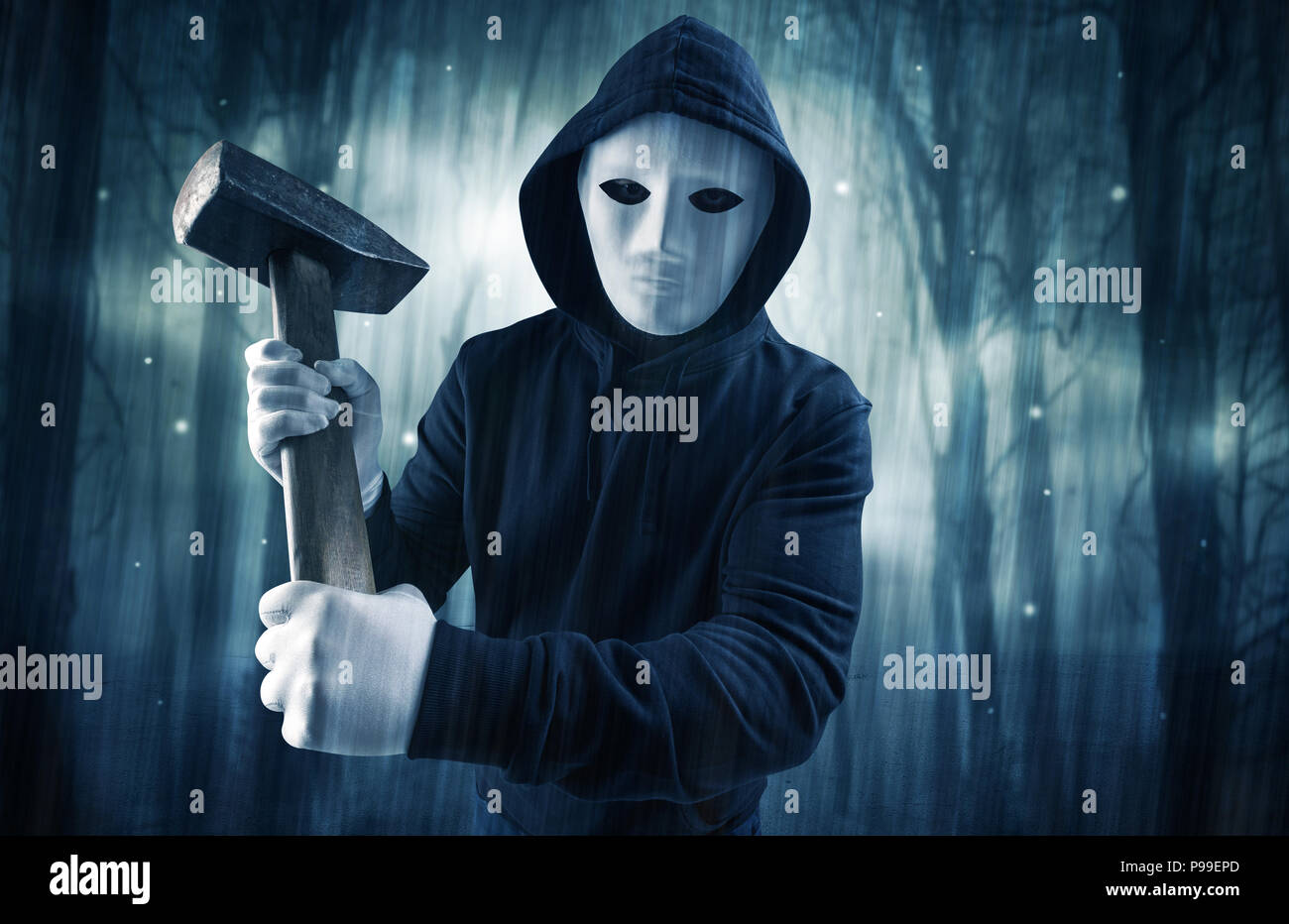 Masked armed hitman in dark thick forest with foggy mysterious concept ...