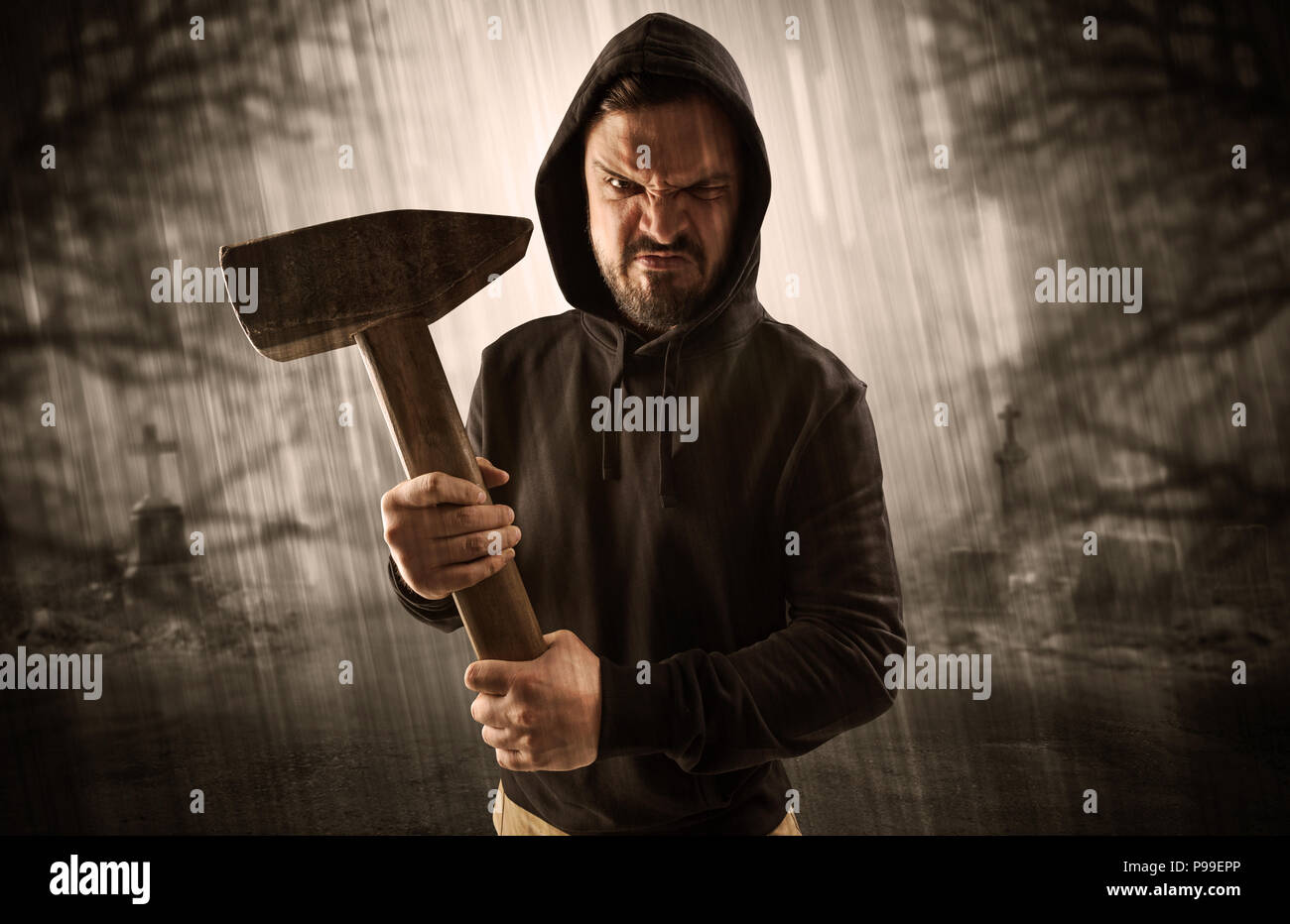 Armed aggressive hunter in abandoned thick forest graveyard concept ...