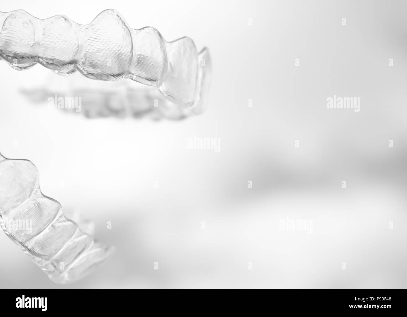 Invisible orthodontics to align the teeth Stock Photo - Alamy