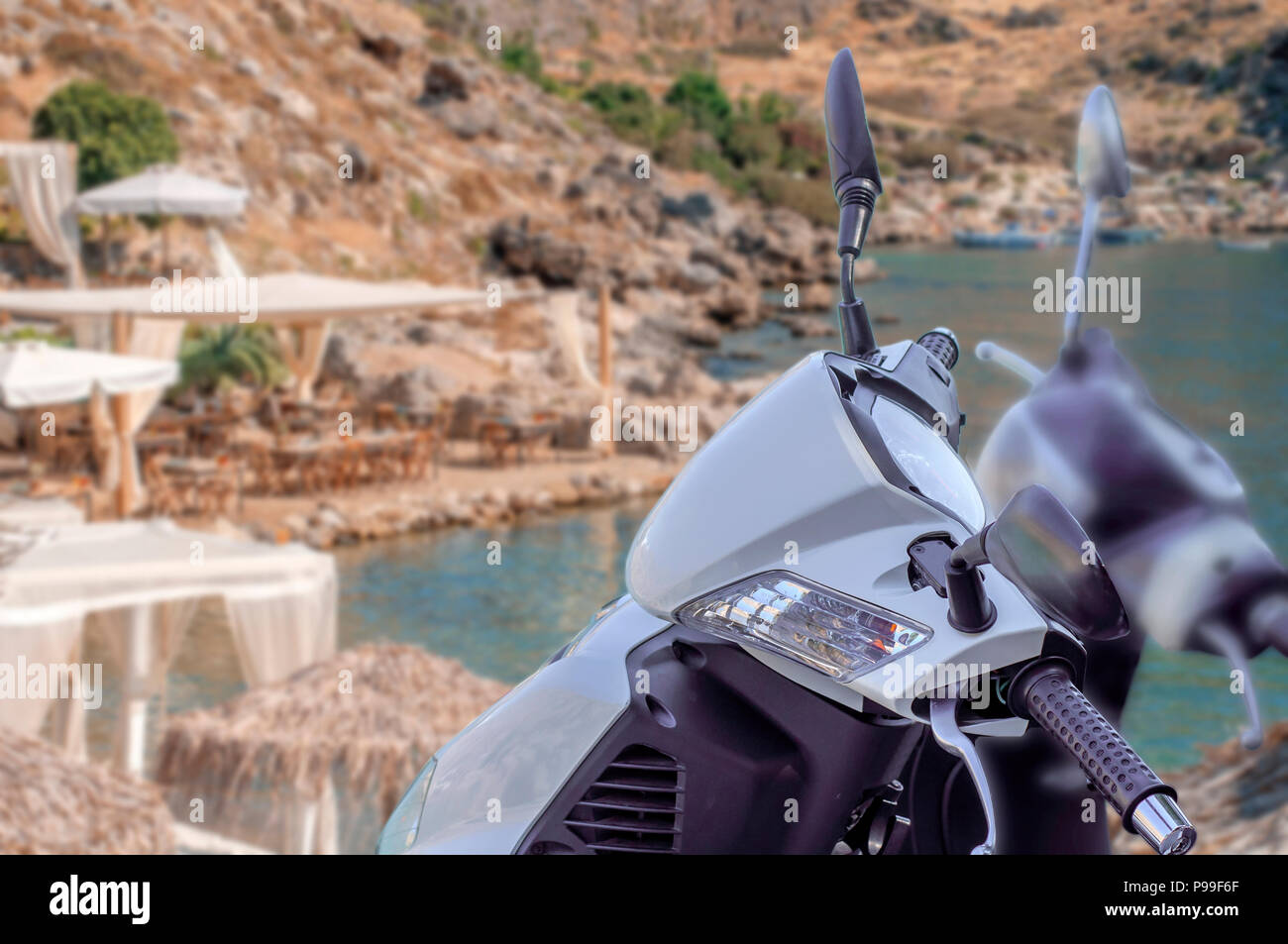 Modern white shiny motorcycle for transportation with beach background ...