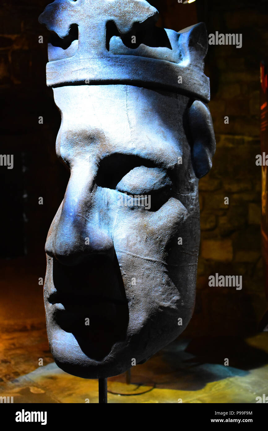 Large sculptured head display at Caernarfon castle, North Wales UK ...