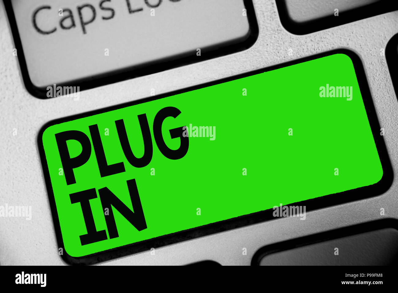 Handwriting text Plug In. Concept meaning putting device into ...