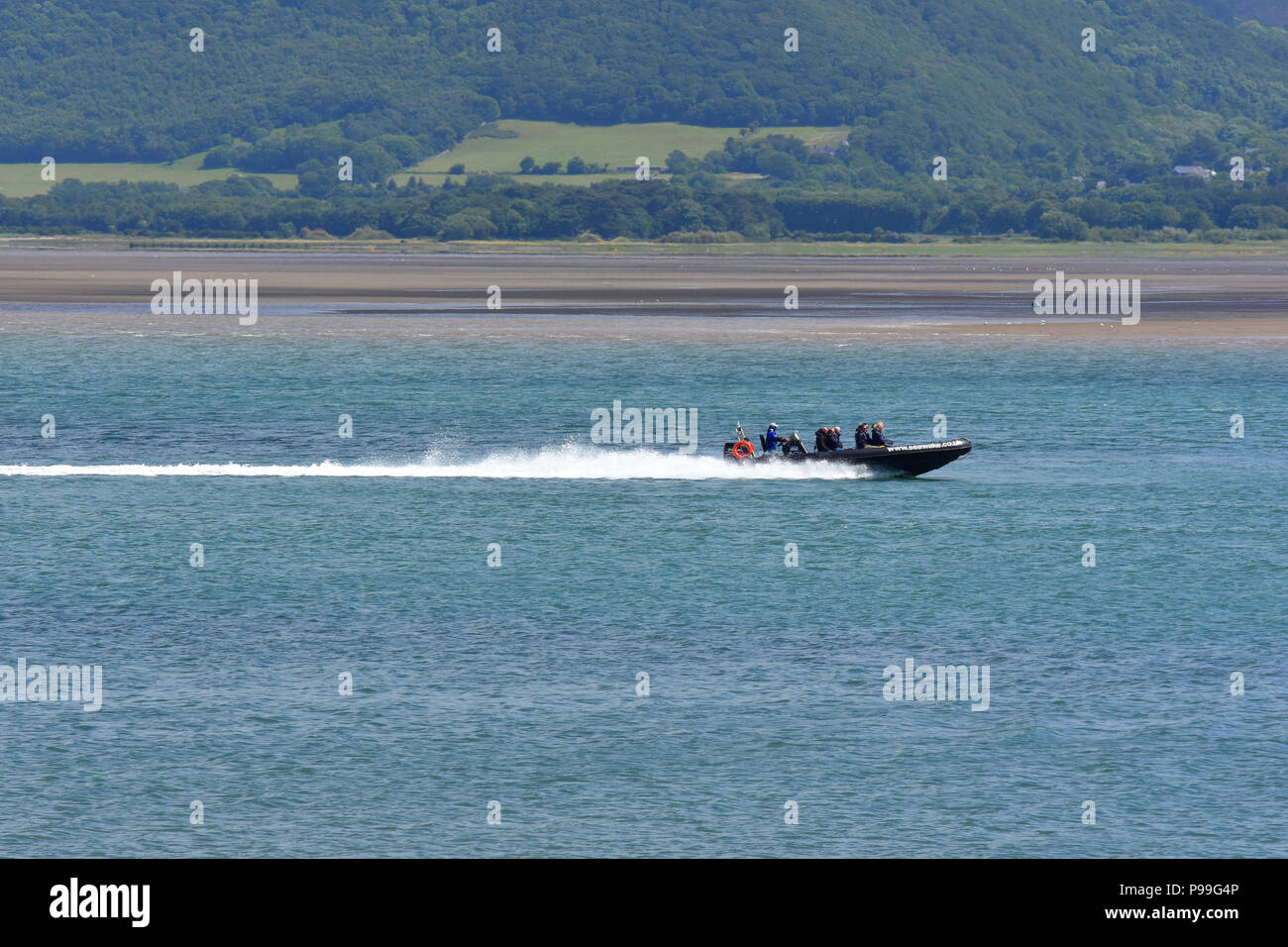 Speed boat trip at Beaumaris North Wales UK Stock Photo - Alamy
