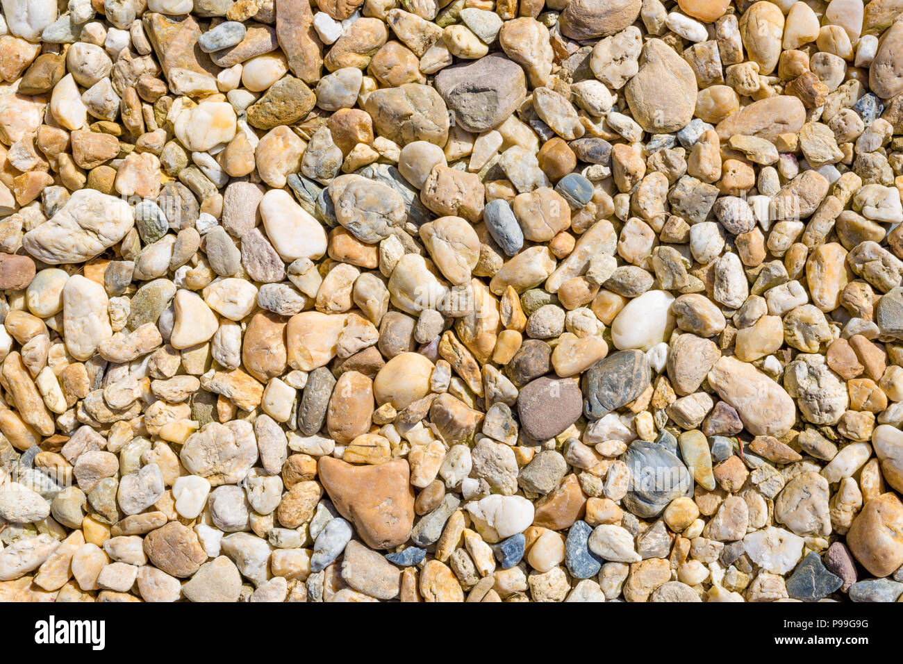 Colorful pebbles texture background Stock Photo - Alamy