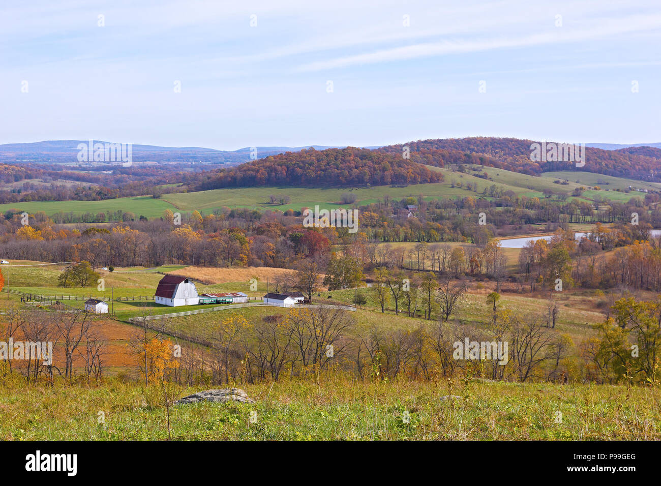 Countryside landscape in autumn. A scenic farm with fields and forests ...
