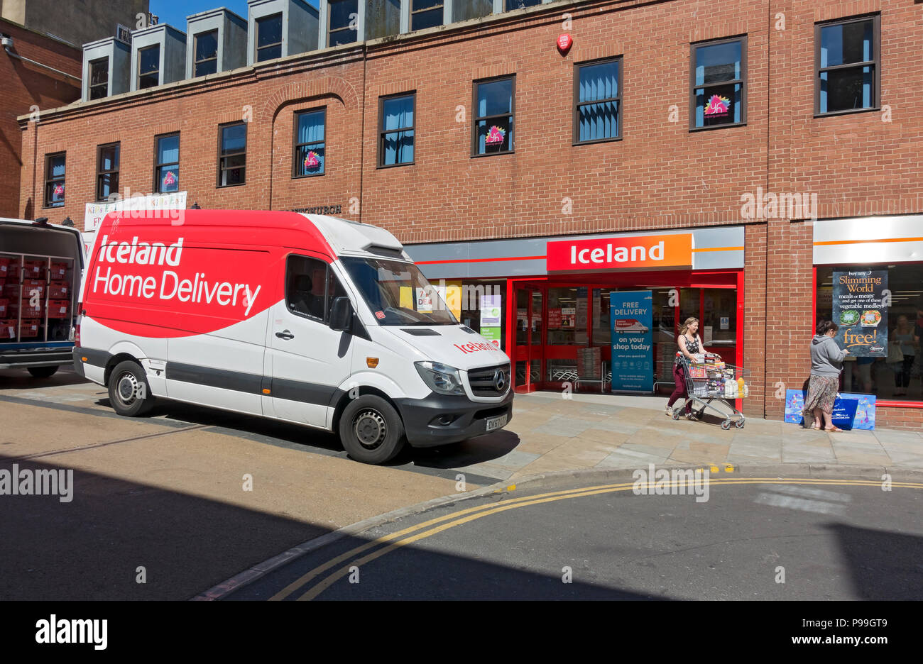 Iceland supermarket food shop store exterior and home delivery van ...