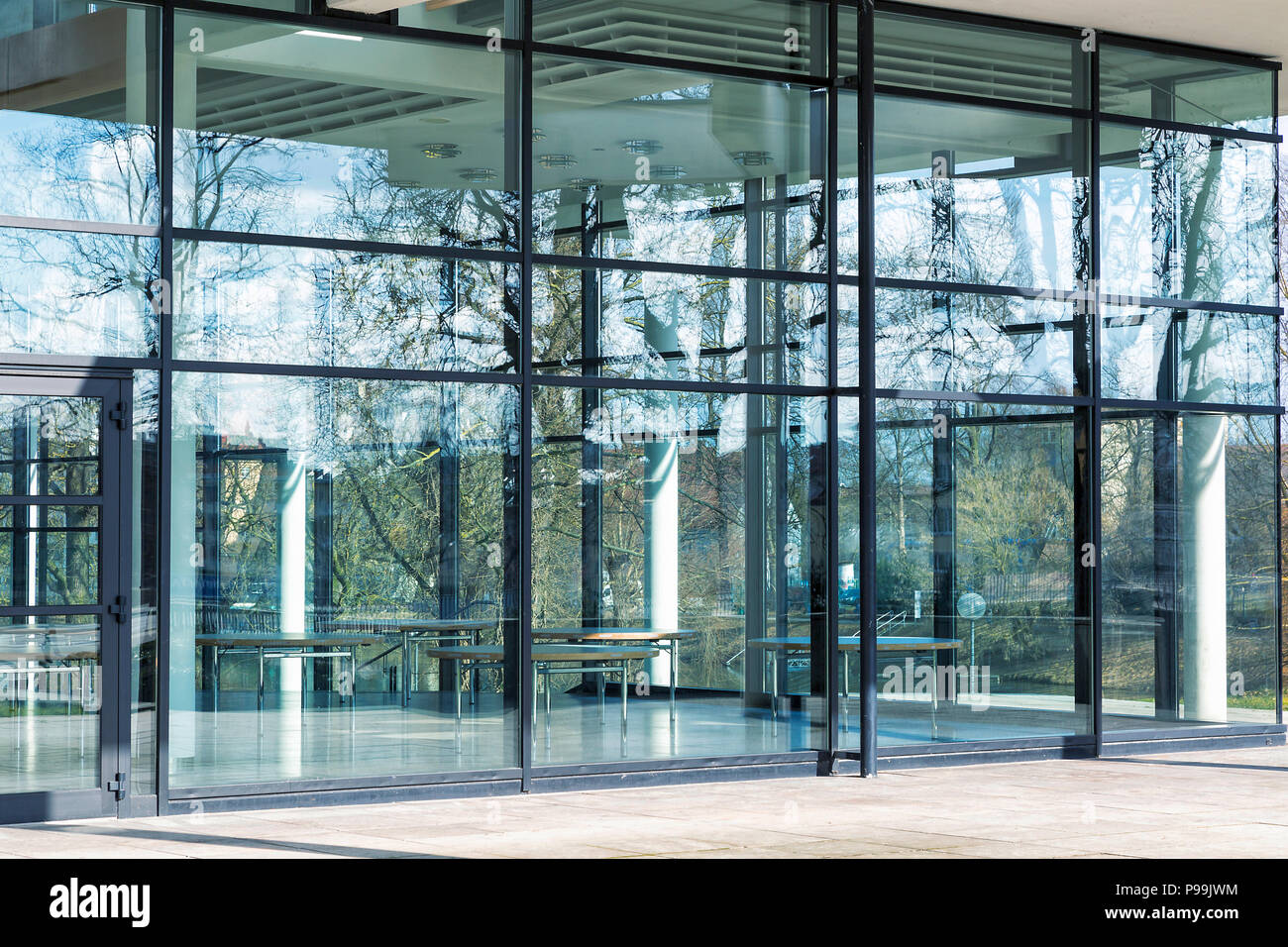 Modern glass building, toned image Stock Photo - Alamy