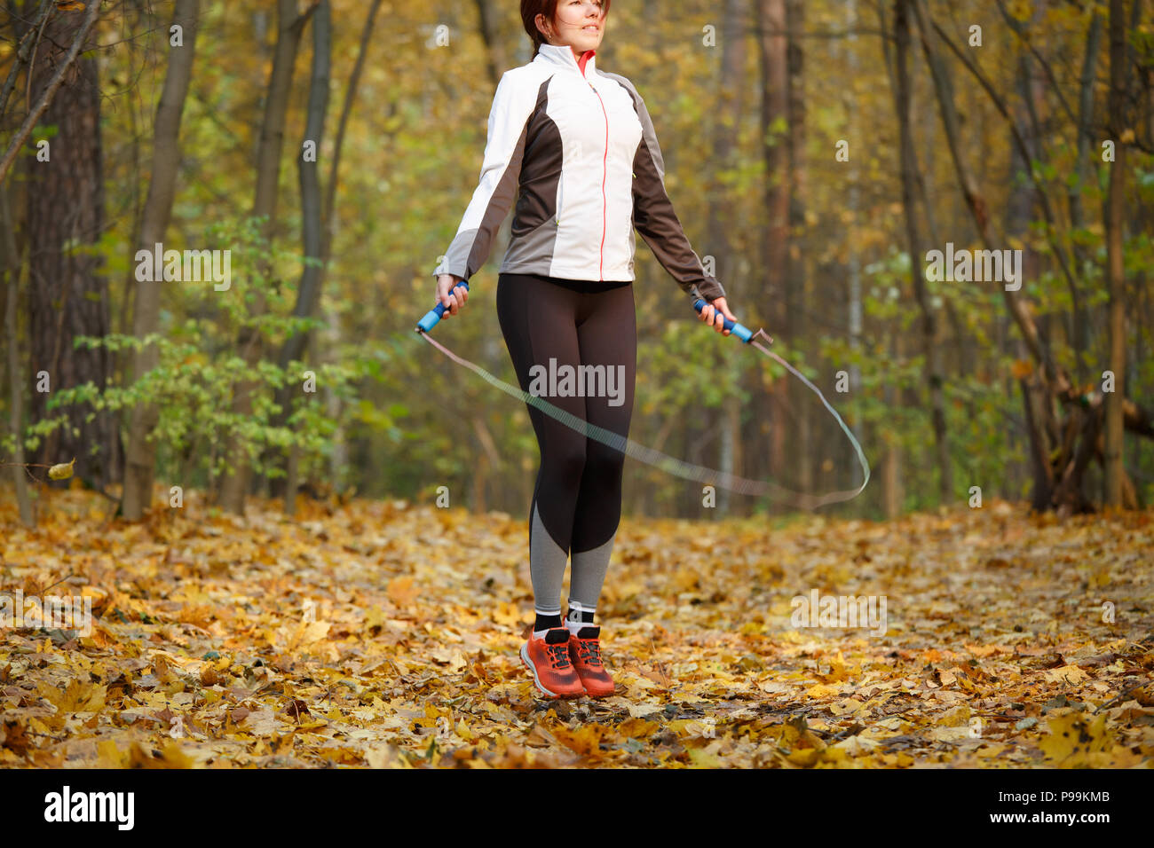 Girl jumping rope hi-res stock photography and images - Alamy