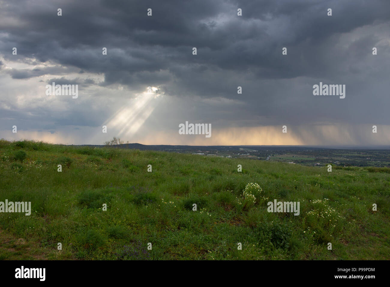 Sun coming through clouds hi-res stock photography and images - Alamy