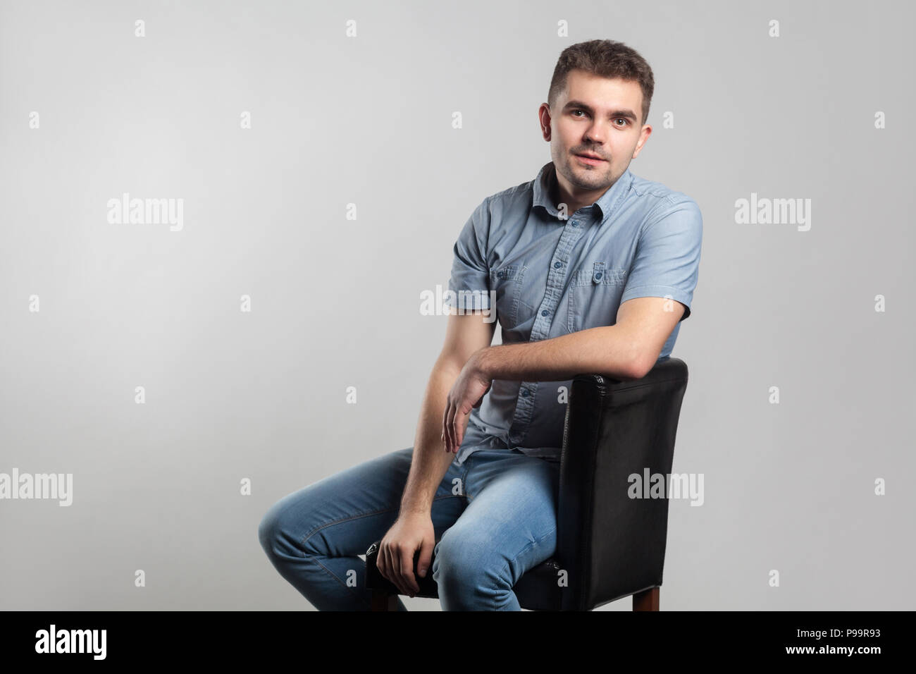 Handsome young adult man little smiling and looking at camera. Actors ...