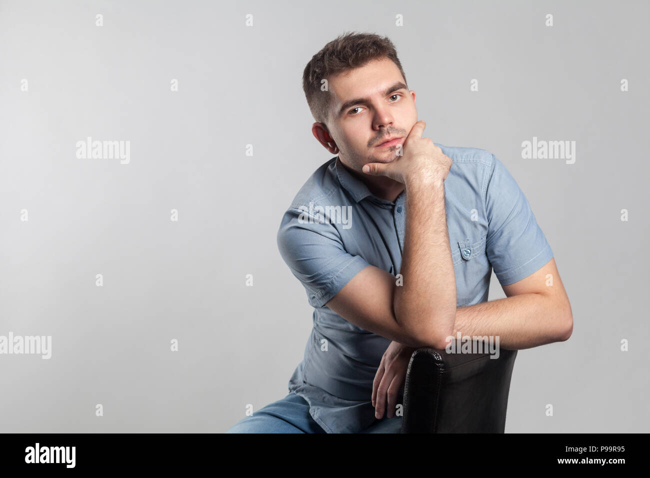 Handsome serious man sit and thinking. Actors portfolio picture ...